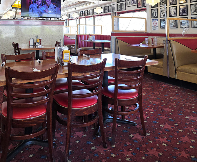 These wooden chairs have supported decades of satisfied diners, family celebrations, and road-weary travelers finding comfort in both food and nostalgia.