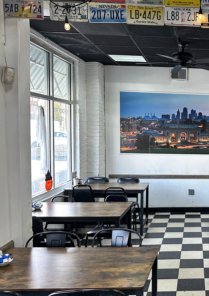 The dining area's simple charm comes with a side of civic pride&mdash;that Kansas City skyline watching over your meal like a metropolitan guardian angel. 