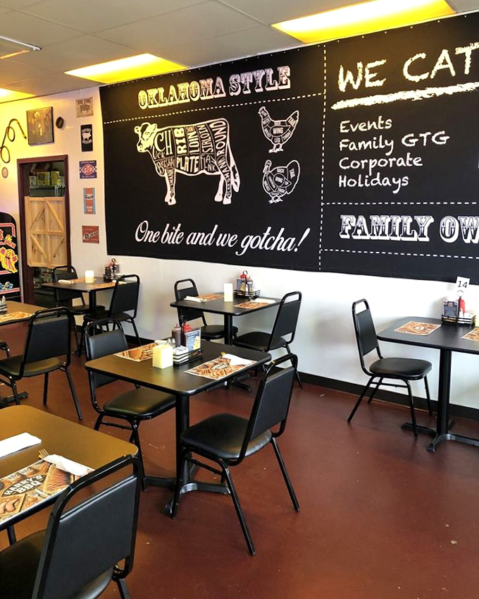 The dining room's chalkboard wall reminds you that in Oklahoma-style barbecue, anatomy lessons are delicious and educational.