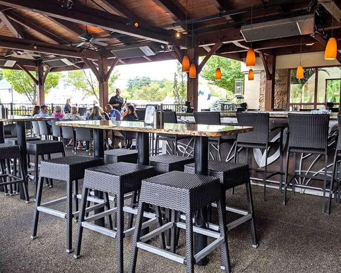 The outdoor dining area combines rustic beams with modern seating&mdash;Pennsylvania fresh air included at no extra charge. Al fresco perfection for those perfect evenings.