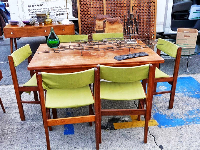 Danish modern dining perfection with avocado-green upholstery that screams "Mad Men dinner party"&mdash;just add martinis and conversations about the space race.