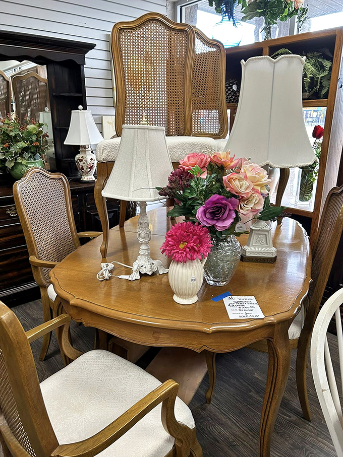 Dining furniture set for a feast, complete with floral arrangements worthy of magazine photography.
