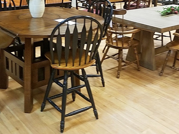 Dining chairs with character await your family gatherings. That black Windsor-style beauty would make even takeout pizza feel like a special occasion. 