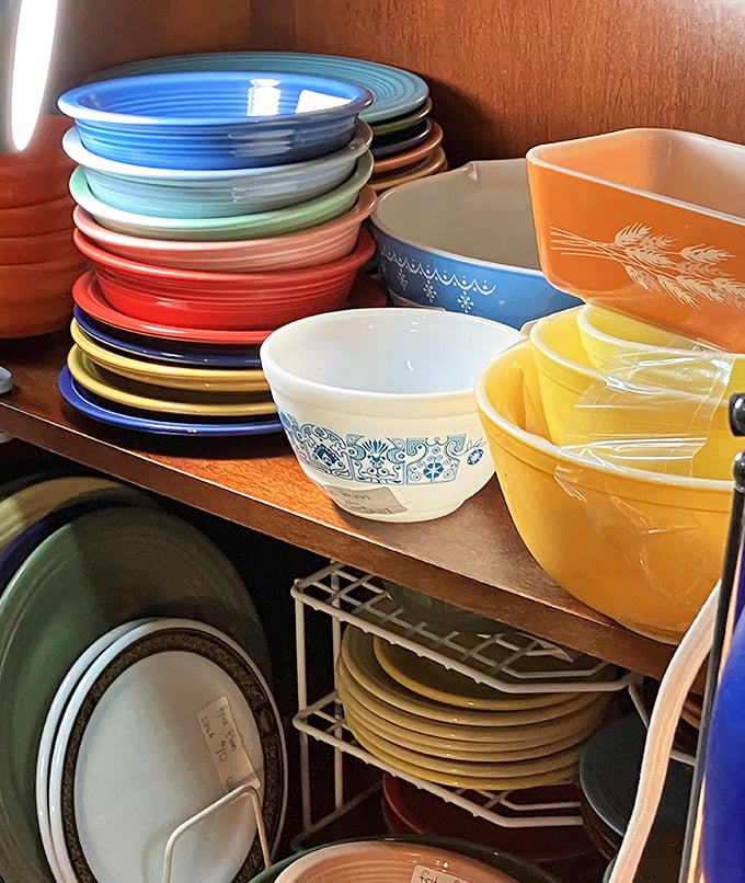 Fiestaware heaven for collectors&mdash;those stacked rainbow plates could brighten any dinner party. The blue cornflower pattern below screams "vintage Corningware."