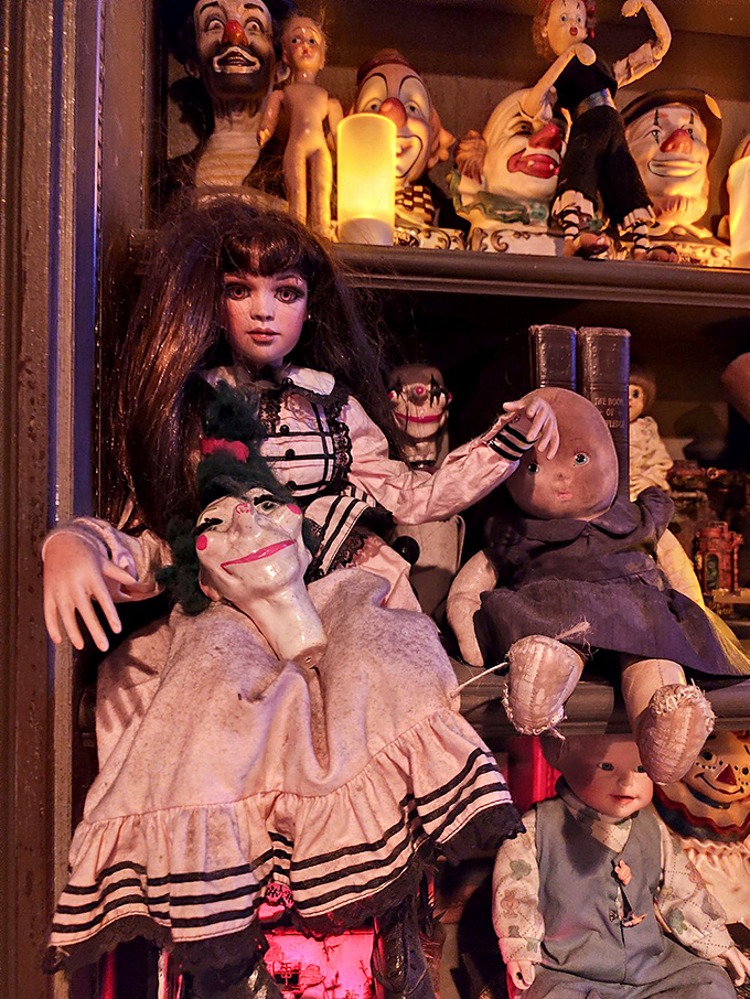 Antique dolls arranged in a family portrait that would make the Addams Family say, "That's a bit much, don't you think?"