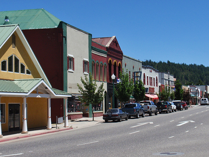 Main Street Quincy&mdash;where colorful storefronts stand shoulder-to-shoulder like old friends posing for a small-town family portrait.