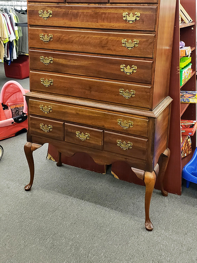 Colonial craftsmanship meets modern bargain hunting. This highboy dresser brings elegance to any bedroom without the antique store price tag.