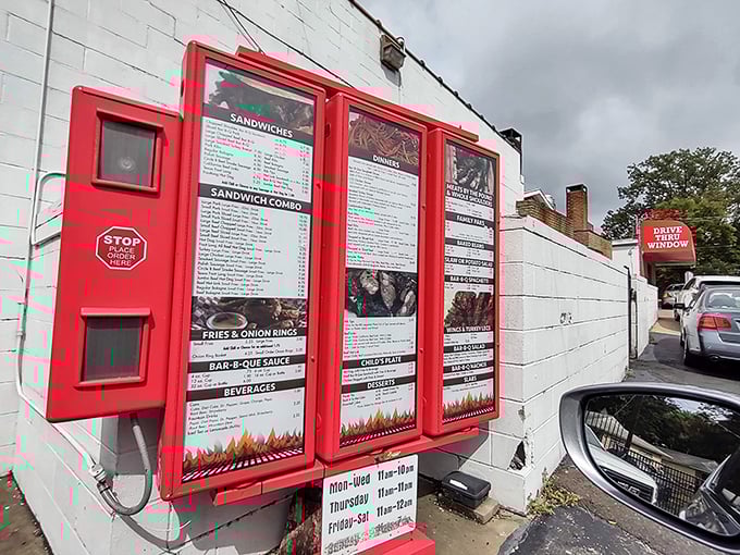 The drive-thru menu glows like a beacon of hope for those too hungry to park&mdash;barbecue salvation without leaving your car.