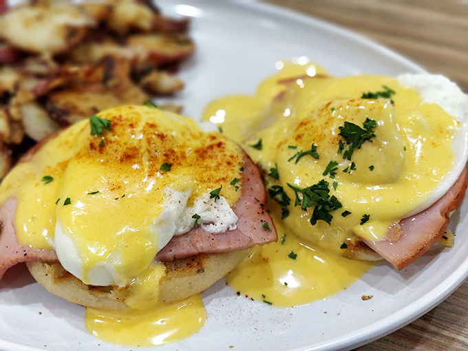 Eggs Benedict that would make the Pope jealous. Hollandaise sauce cascading down like a yellow waterfall of breakfast bliss.