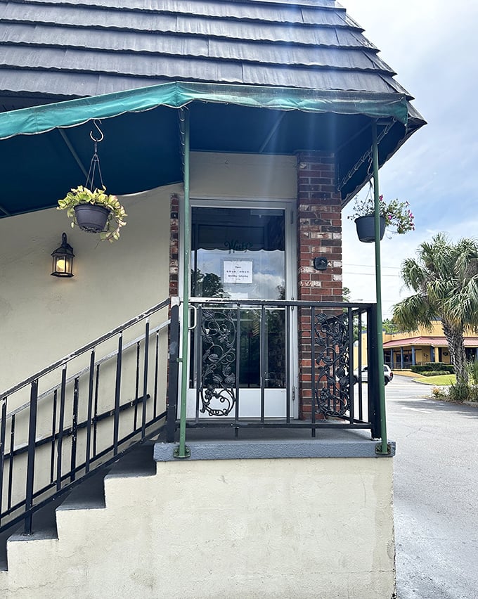 The entrance to Wolfy's&mdash;complete with hanging plants and a green awning&mdash;like the gateway to a more delicious dimension of breakfast.