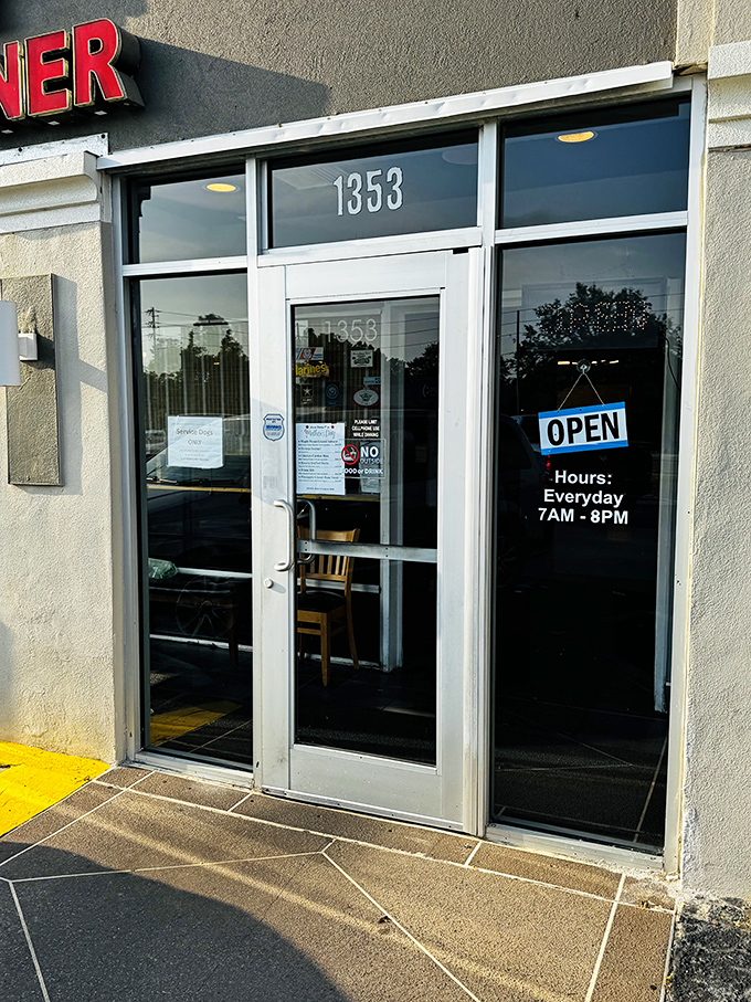 The entrance tells you everything you need to know: open daily 7AM-8PM, because hunger doesn't take days off.