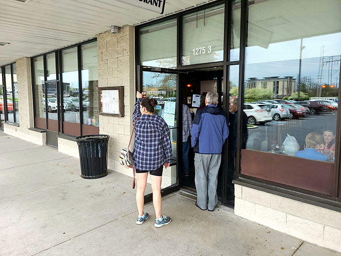 The entrance where hungry pilgrims line up, drawn by the siren call of home cooking that doesn't require doing dishes afterward.