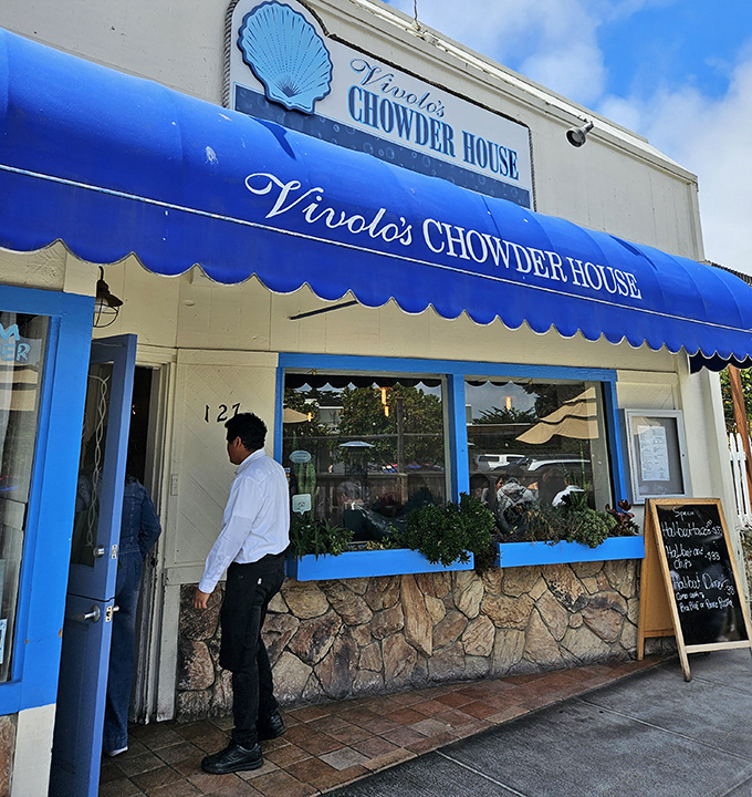 The entrance to happiness is marked by a bright blue awning. Each person walking through is about to have their day improved.