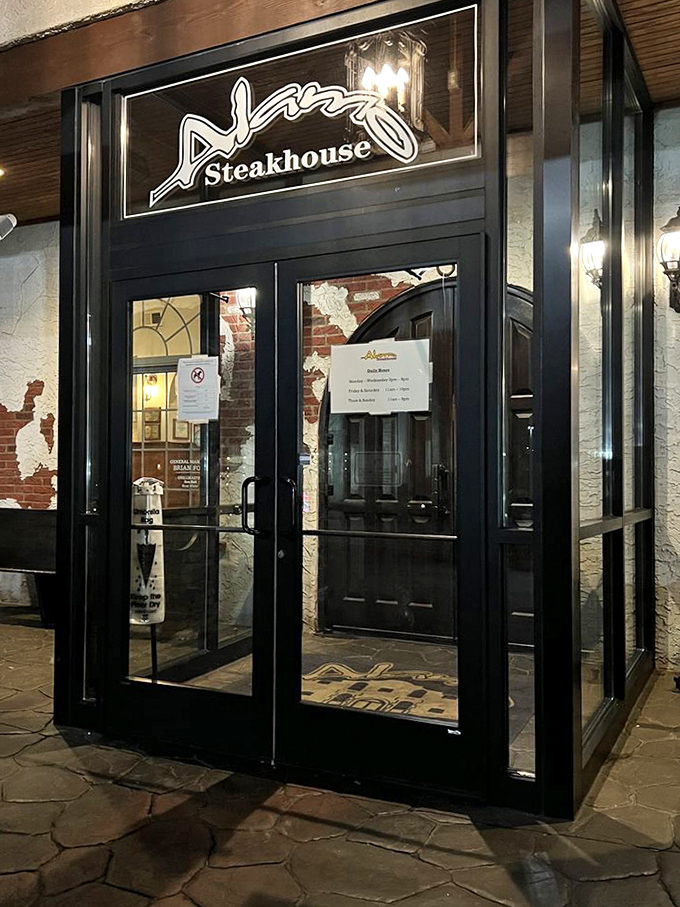 The entrance beckons like a portal to flavor country, with elegant lighting that says, "Yes, this is where the magic happens."