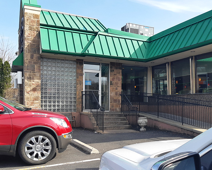 The entrance that's welcomed generations of hungry patrons. Those stone columns and glass blocks have witnessed countless "I'm so full" departures.