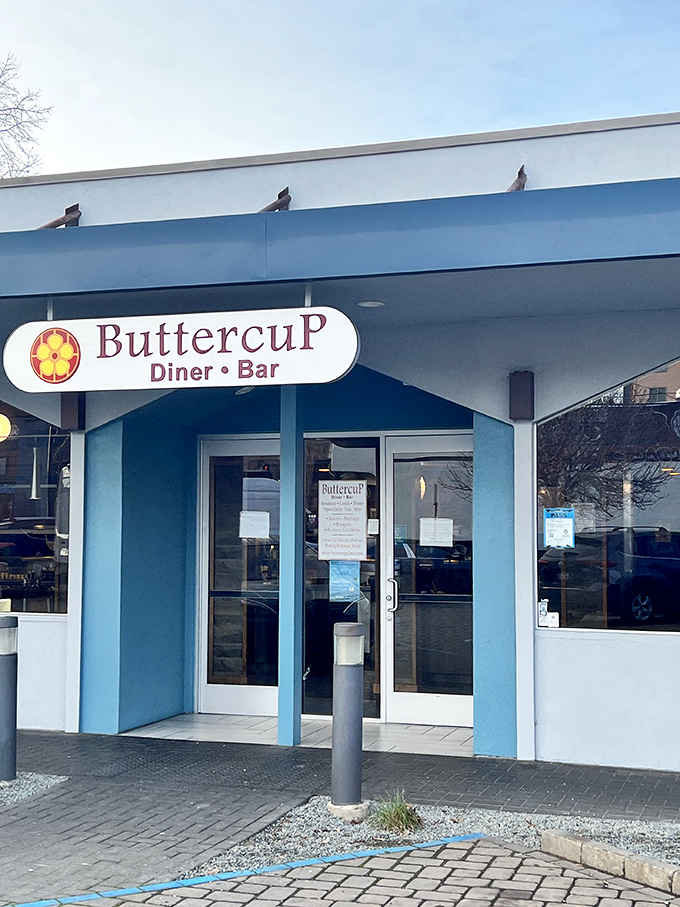 The cheerful yellow Buttercup sign welcomes hungry patrons like an old friend who always knows exactly what you need before you do.