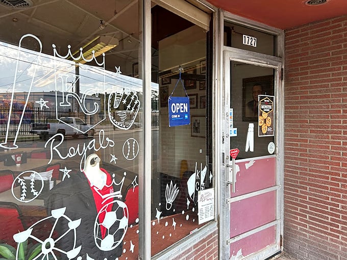 The entrance to barbecue paradise&mdash;where Kansas City sports pride meets the promise of smoky delights just beyond that unassuming door.