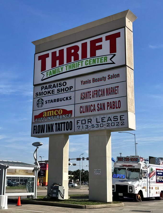 The roadside marquee announces Family Thrift Center's presence among an international array of neighboring businesses.