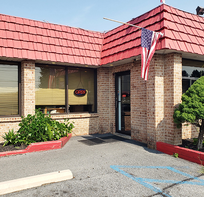 The entrance beckons with unpretentious charm. That "OPEN" sign might as well say "Come on in, we've been expecting you."