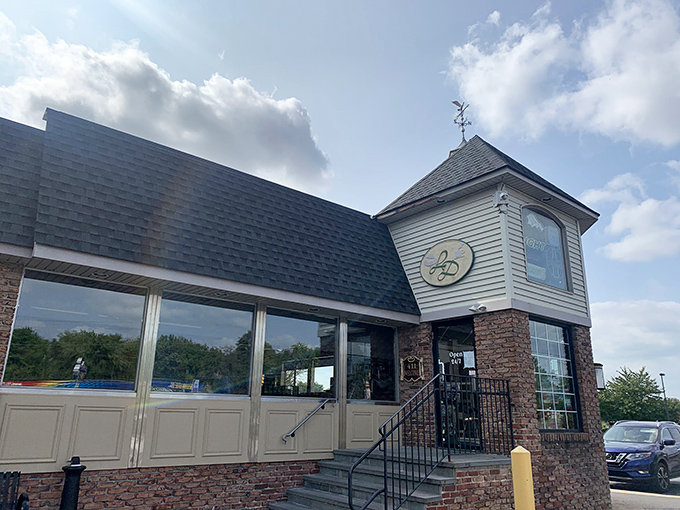 The entrance that promises pancake paradise awaits inside. That turret-style architectural feature says, "Yes, we take breakfast seriously around here." 