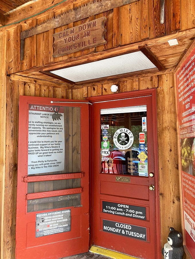 Calm Down You're In Forksville &ndash; sage advice above a red door that promises culinary salvation to those who've made the pilgrimage.