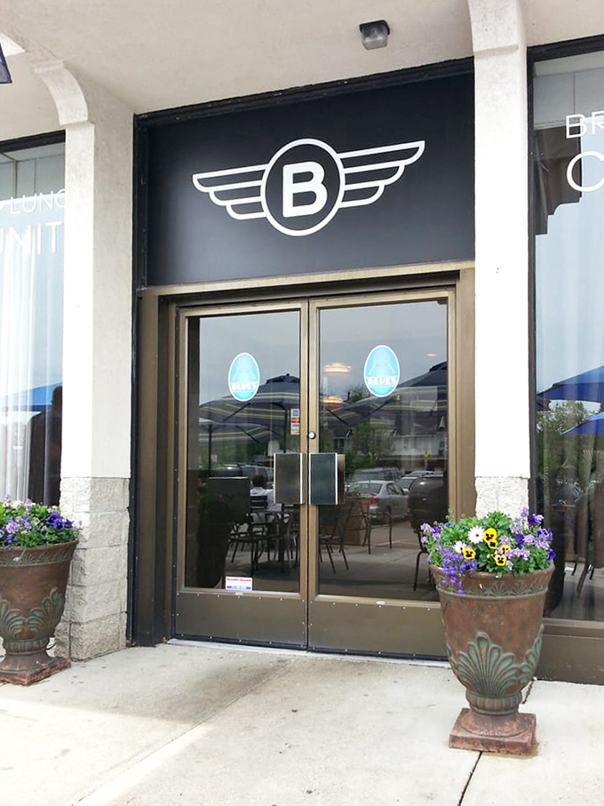The entrance with its winged "B" logo &ndash; like breakfast superhero headquarters. Behind these doors, pancake justice is served hot and fluffy.