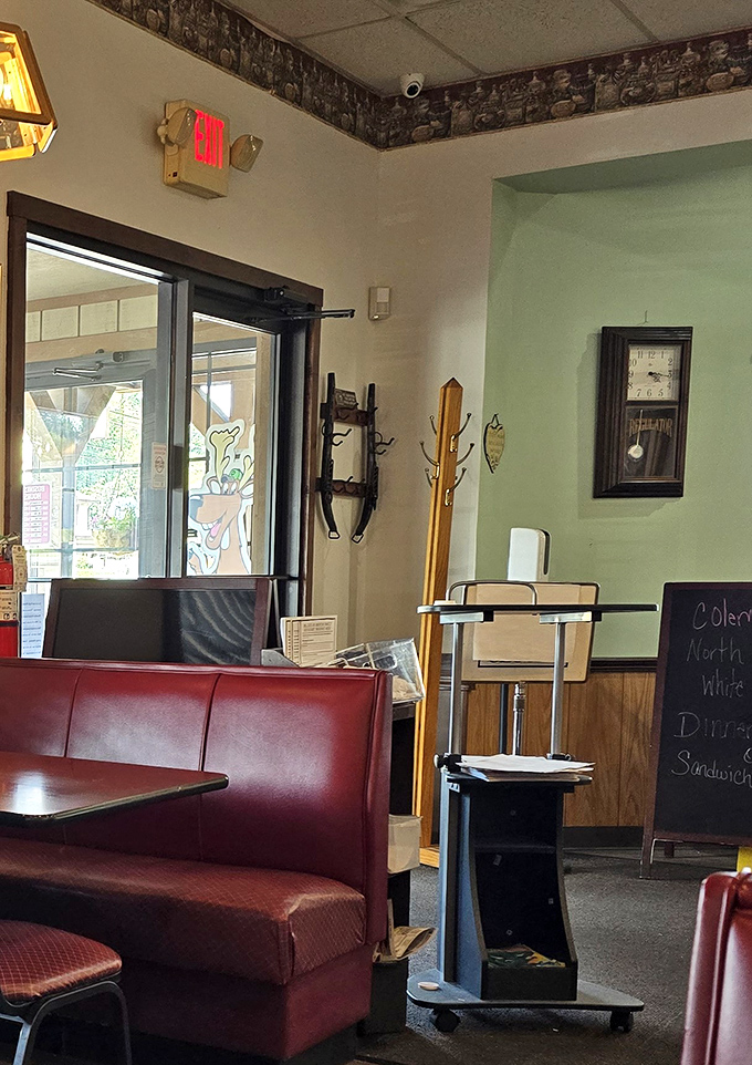 The cozy corner booth&mdash;prime real estate in the diner universe. Where conversations flow as easily as the coffee refills.