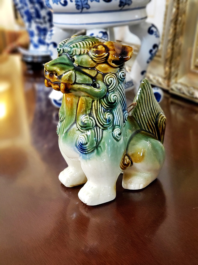This glazed ceramic foo dog doesn't just guard your knickknacks&mdash;it brings a splash of mystical charm and history to any shelf.