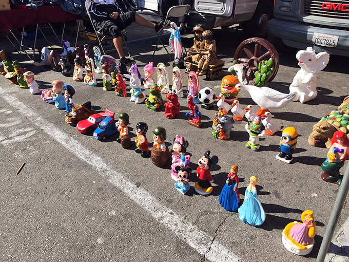 Tiny treasures lined up like eager performers at an audition. Each figurine has a personality bigger than its pint-sized stature.