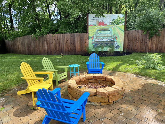 Colorful Adirondack chairs circle a stone fire pit like a summer camp for grown-ups. Some of the best post-dinner conversations happen right here, under Ohio skies.