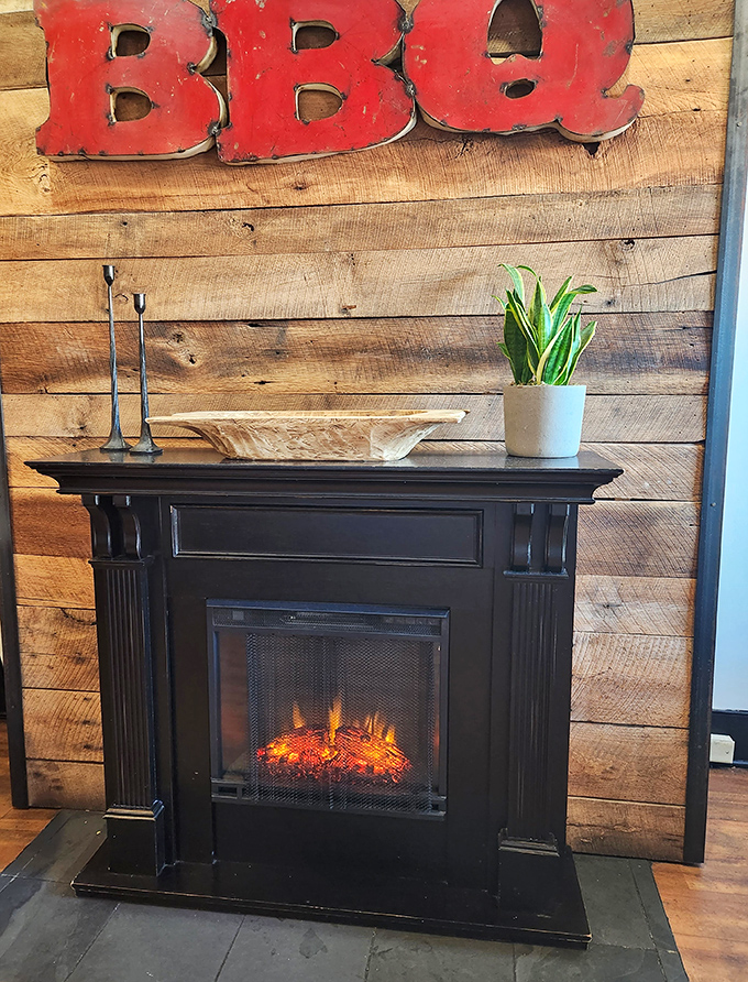 Even the fireplace knows its role in this temple of smoke&mdash;creating that warm, inviting atmosphere that makes you want to linger just a little longer. 