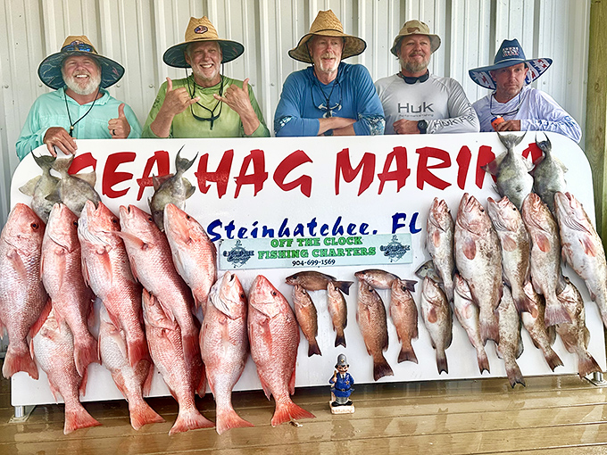 Proud anglers display their impressive catch&mdash;evidence that Steinhatchee's waters deliver on their promises of piscatorial abundance.