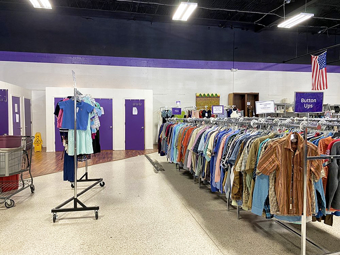 Purple doors mark fitting rooms like portals to alternate fashion dimensions&mdash;what goes in as "maybe" often emerges as "definitely." 