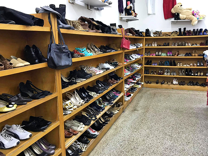 The shoe section: a footwear library where every pair tells a story, from barely-worn wedding heels to well-loved sneakers.