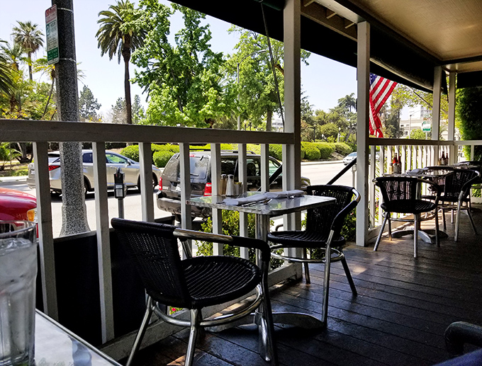 Front porch seating channels peak California living&mdash;palm trees in view while you contemplate whether to order sweet or savory.