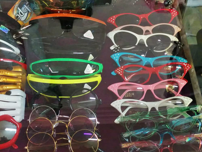 Cat-eye frames in candy colors sit alongside John Lennon circles&mdash;eyewear that sees the world through decades of style.