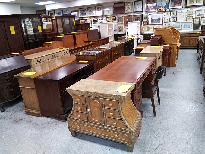 Desks and dressers stand at attention like wooden soldiers, each with drawers full of potential and history.