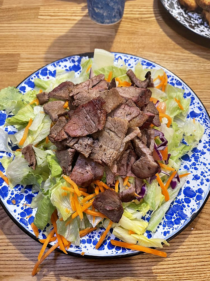 A salad that doesn't apologize for being at a BBQ joint. Topped with perfectly smoked tri-tip, it's the rare salad that makes carnivores nod in approval.
