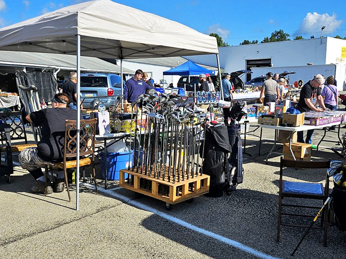 Golf clubs standing at attention, ready to improve someone's game or at least their garage d&eacute;cor.