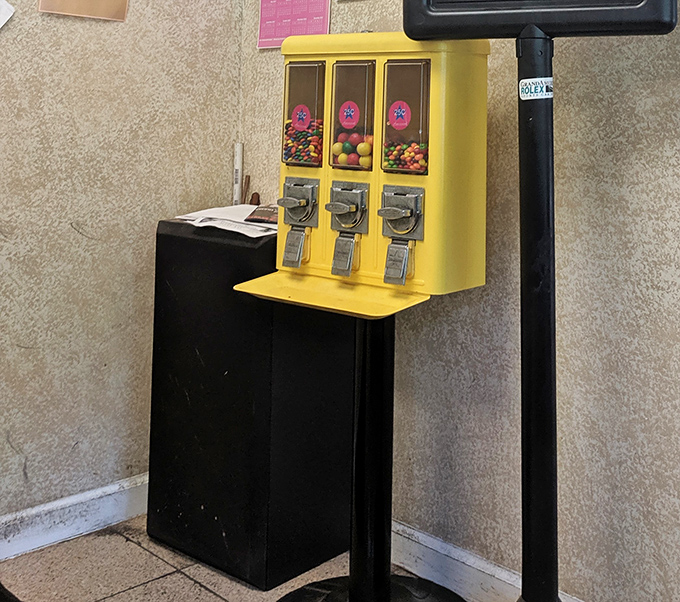 Even the gumball machine feels nostalgic, like it's been dispensing colorful treats since before smartphones replaced simple pleasures.