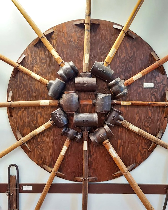 This sunburst of hammer heads isn't just tools&mdash;it's a monument to the hands that built fences across a continent.