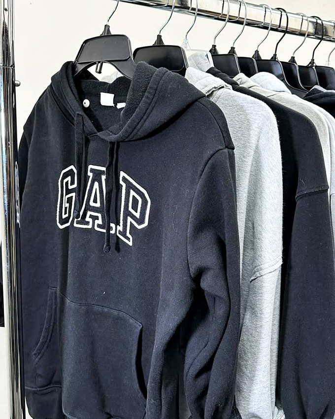 GAP hoodies hanging like old friends, ready to become your new weekend comfort companions without emptying your savings.