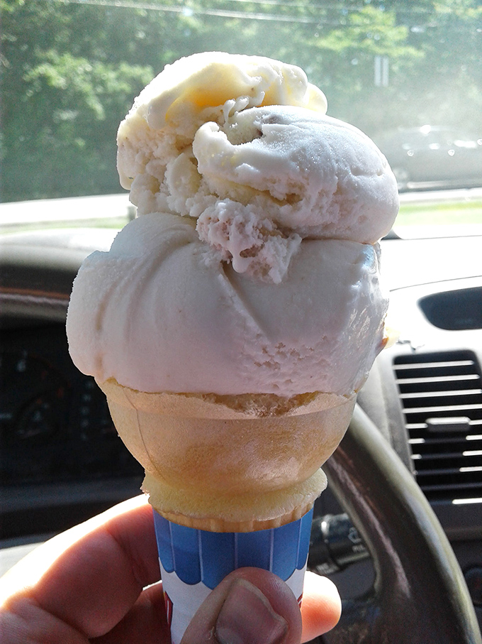 Ice cream stacked so high it defies both gravity and restraint&mdash;the perfect mobile dessert for cruising down Mentor Avenue on a summer day.