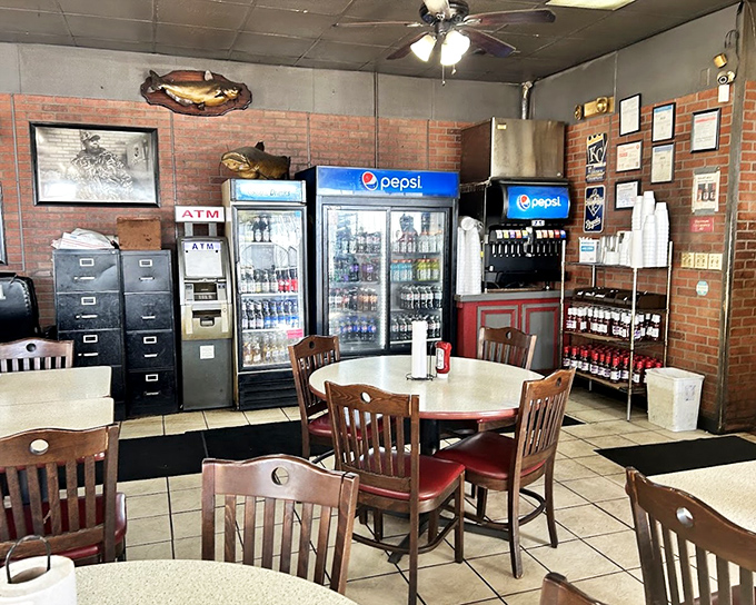 No designer lighting or fancy fixtures here&mdash;just the warm glow of barbecue anticipation and decades of smoke-infused wisdom.