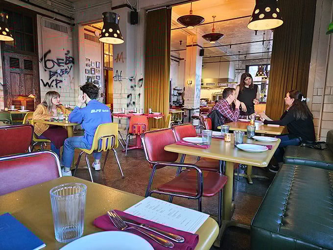 Where vintage school furniture meets modern dining comfort. Irwin's eclectic interior design creates conversation spaces as memorable as the menu itself.