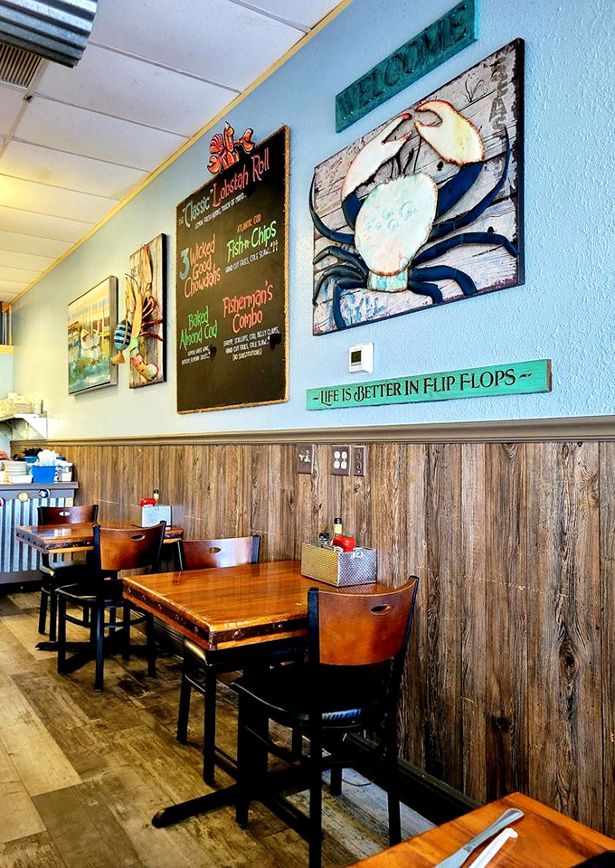 Coastal artwork and "Life is Better in Flip Flops" wisdom create the perfect dining ambiance.