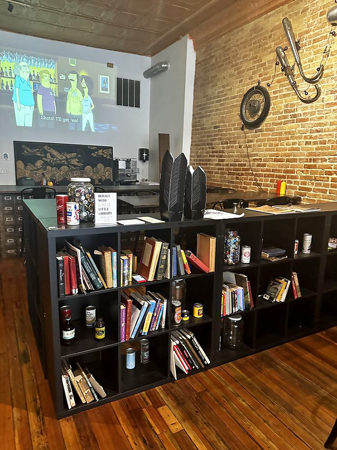 A bookshelf that says, "Stay awhile, read something." Because great burgers deserve thoughtful companions &ndash; both human and literary.