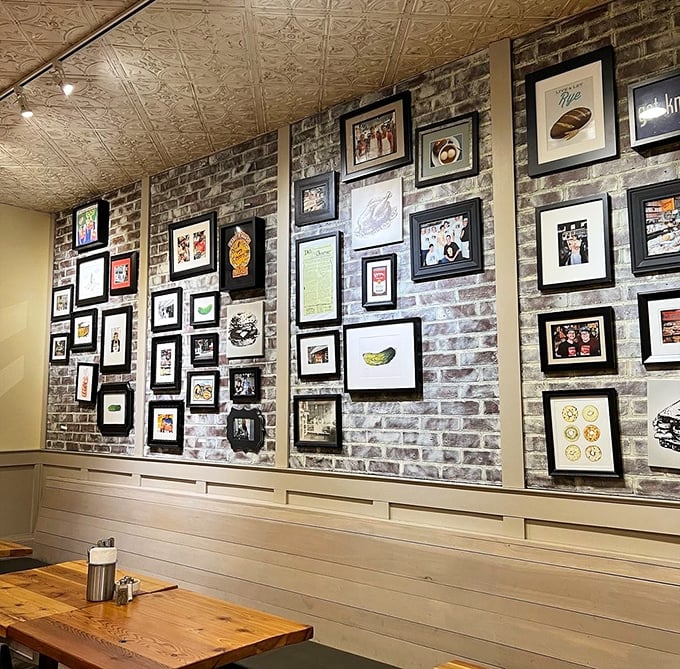 Gallery walls tell stories while you eat – every frame a reminder that food creates memories.