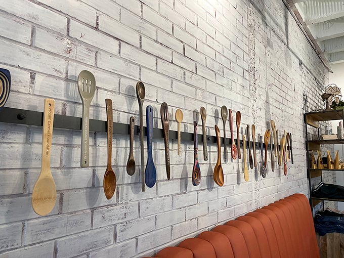 Wooden spoons line the wall like badges of honor &ndash; each one representing countless meals that have changed more than just hunger.