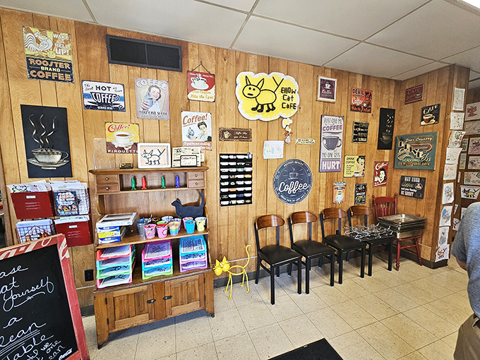 The wall of coffee signs isn't decoration&mdash;it's a manifesto. Yellow Cat takes its caffeine seriously, and the wood-paneled shrine proves it.